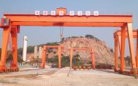 China 100KN - 3000KN Double Girder Gantry Crane 25 Ton Mobile Outdoor Steel Coil Lifting for sale