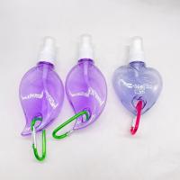 China PET Heart / Leaf Shape Plastic Spray Bottle with Hanging Key Chain Collar Material PET for sale