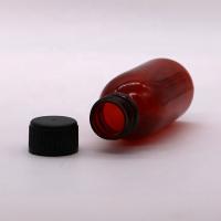 China 100ml PET Plastic Liquid Medicine Bottle with Measuring Cup 28mm Neck for sale