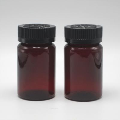 China 2oz 60ml PET Amber Black Plastic Bottle with CRC Cap for Medicine Supplement Packaging for sale