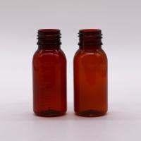China 60ml Amber PET Liquid Medicine Bottle with 28mm Lid Scaled Container for sale