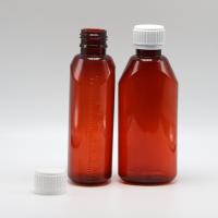 China 200ml Oval Amber PET Liquid Medicine Bottle with 28mm Neck and Scale for sale