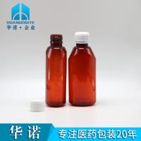 China 200ml Oval Amber PET Liquid Medicine Bottle with 28mm Neck and Scale for sale