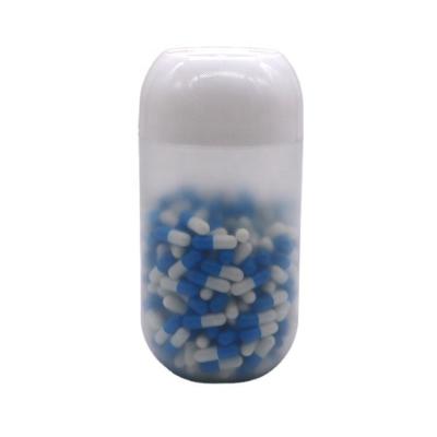 China Screw Cap 550ML PP Capsule Shaped Plastic Food Jar for Biscuit Candy Customized Color for sale