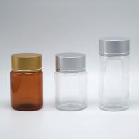 China Refillable 60ml Amber PET Pill Capsule Bottle with 34mm Silver Aluminum Screw Cap for sale