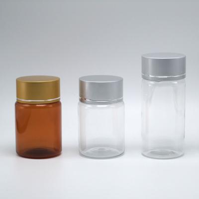 China Refillable 60ml Amber PET Pill Capsule Bottle with 34mm Silver Aluminum Screw Cap for sale