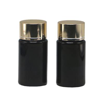 China GMP 50ml PET Plastic Medicine Pill Bottle with Gold Silver Coating Screw Cap for sale