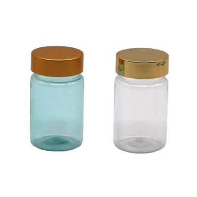 China 70ml PET Plastic Pill Bottle for Health Care with Gold Silver Cap for sale