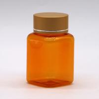 China 90ml 3oz PET Square Pill Bottle Yellow Orange with Rose Gold Cap Heat Seal for sale