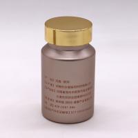 China PET Frosted Plastic Bottle 100ml for Pills Capsules with Gold Silver Cap Custom Logo for sale