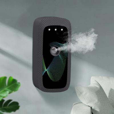 China Plastic Hotel Bathroom Wall Mounted Electric Aromatherapy Essential Oil Fragrance Air Scent Diffuser for Home and Office for sale