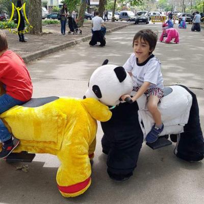 China Hansel electronic dog toy electric riding toys plush toys stuffed animals on wheels for sale