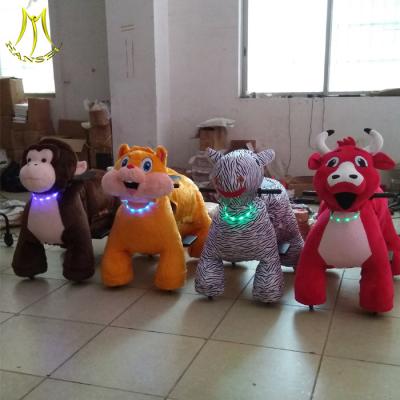 China Hansel 2018 ride for kids plush stuffed electric battery operated ride animals on wheels for sale