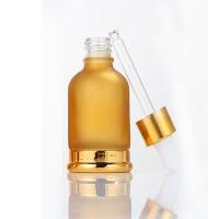 China Luxury Gold Dropper Frosted Glass Essential Oil Bottle Round Shape for sale