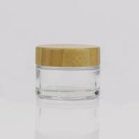 China 40ml 75ml 180ml Transparent Cosmetic Glass Jars With Bamboo Lid for sale