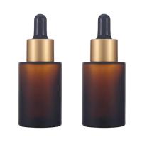 China Round Amber Glass Cosmetic Serum Essential Oil Bottle 15ml 30ml 50ml for sale