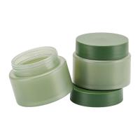 China Matcha Green Cosmetic Glass Jars 15g Glass Containers For Skin Care Products for sale