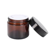 China 5g 20g 4oz 8oz Cosmetic Glass Jars Black Cap Amber Apothecary Jars for sale