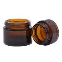 China 5g 20g 4oz 8oz Cosmetic Glass Jars Black Cap Amber Apothecary Jars for sale