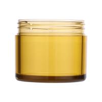 China SGS 120g 150g Cosmetic Yellow Glass Jar Round Glass Canister With Lid for sale