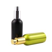 China Metal Press Pump Golden Matte Black Aluminum Bottle For Cosmetics for sale