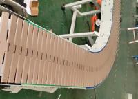 China Stainless Steel Turning Slat Chain Conveyor for Bottles and Tins for sale