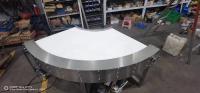 China Custom Carbon Steel/Stainless Steel Curved Belt Conveyor with Adjustable Height for sale