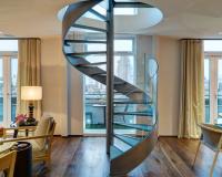 China Modern Steel Spiral Stairs with Stainless Steel Balustrade Custom Width 700-1800mm for sale
