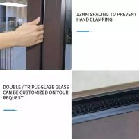 China Anti Pinch Hand Aluminum Sliding Bifold Door 6060-T66 2.0mm Brown Glass for sale