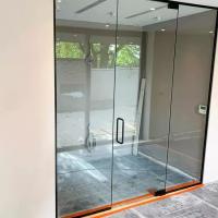 China Aluminum Alloy Frameless Swing Glass Door Tempered Commercial Double Glass Door 10-15mm for sale