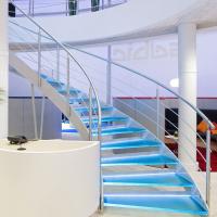 China Modern LED Curved Steel Stairs Customized Luxury Powder Coat SUS304 10mm Glass Thread for sale