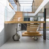 China Modern Wood Floating Staircase Design for Indoor Commercial Building 300mm Stringer for sale