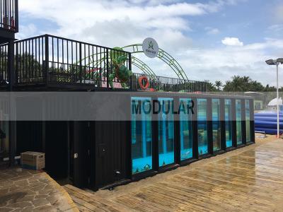 China Luxury Prefab Portable Container Swimming Pool 12m x 2.25m with High Strength Glass Wall for sale