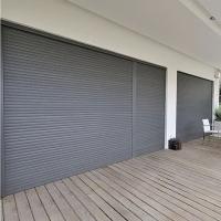 China High Quality Home Storm Shutters Hurricane Remote Garage Doors With Security System for sale
