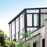 China Aluminum Frame Slant Roof Sunroom Balcony Free Standing Winter Garden 6063-T5 for sale
