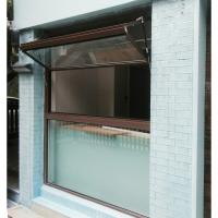 China Soundproof Magnetic Screen Bifold Glass Window Aluminium Doors 5mm Low-E Toughened Glass for sale