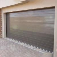 China 16x7 Horizontal Sliding Overhead Roll Up Garage Door 40mm PU Insulated Panel for sale