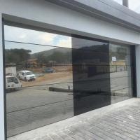 China Aluminum Full View Glass Garage Door 12 16 18 Foot Frameless Double Automatic for sale