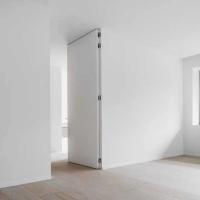 China Swing Opening MDF Wooden Interior Door Water Resistant Invisible Design 40mm Thickness for sale