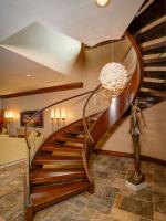 China Custom Wrought Iron Spiral Staircase with Glass Railing 1000mm Width for sale