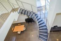 China Custom Wrought Iron Spiral Staircase with Glass Railing 1000mm Width for sale