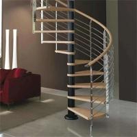 China Indoor Space Saving Spiral Staircase Wood Tread 800-1500mm Stainless Steel 76-114mm for sale
