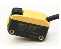 China Background Suppression Photoelectric Sensor 30-400mm Range Laser Spot NPN Output for sale