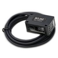 China Background Suppression Photoelectric Sensor 50mm-1200mm Detection Distance NPN 12-24V DC for sale