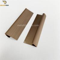 China Shiny Coffee Aluminum Carpet Transition Strip 8.4mm 6063 Alloy with Nails for sale