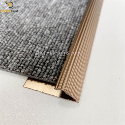 China Shiny Coffee Aluminum Carpet Transition Strip 8.4mm 6063 Alloy with Nails for sale