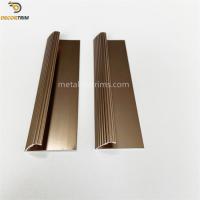 China Shiny Coffee Aluminum Carpet Transition Strip 8.4mm 6063 Alloy with Nails for sale