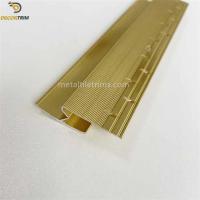 China 6063 T5 Aluminum Carpet Transition Strip Bright Gold 3m with Hooks and Adhesive Glue for sale