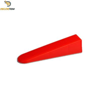 China PP Red Reusable Tile Leveling Wedges 100pcs per Bag for Ceramic Floor and Wall Installation for sale