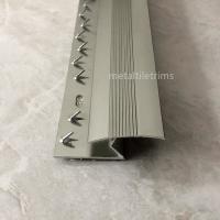 China Shiny Champagne Zig Zag Carpet Transition Strip With Gripper Punching for sale